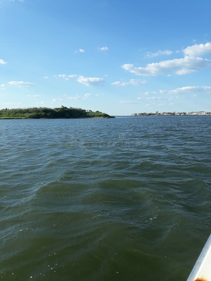 Lake side stock image. Image of calm, ocean, side, rock - 231436301