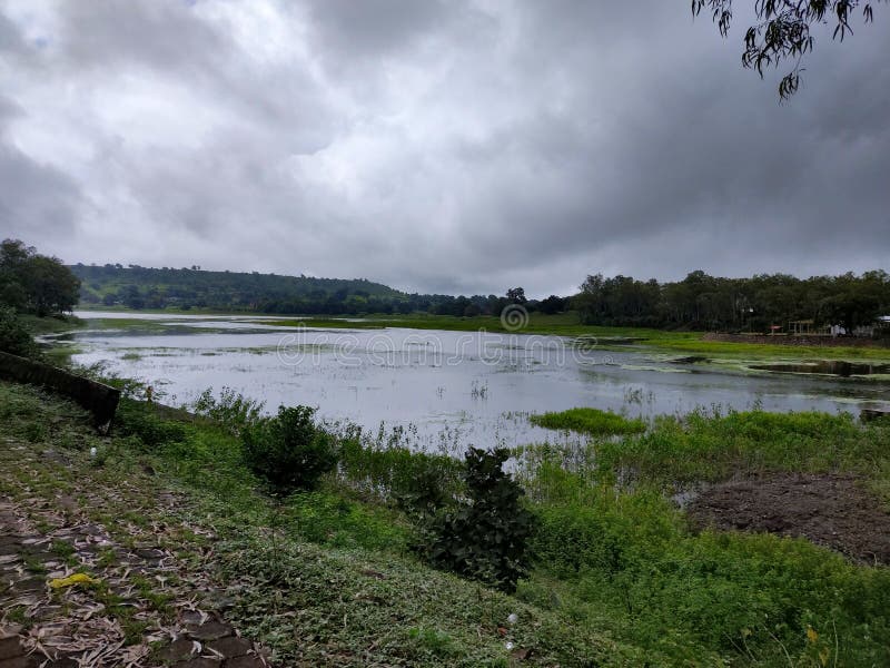 Lake Side View India Blue Water Under Blue Sky with Green Trees. Stock ...