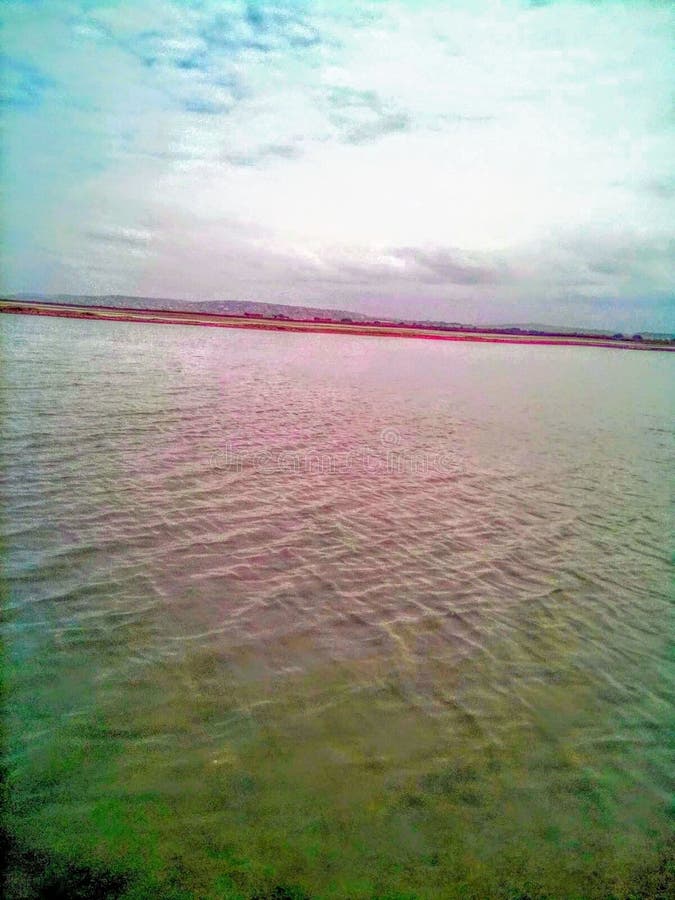 Lake side view stock image. Image of dawn, side, horizon - 225201579