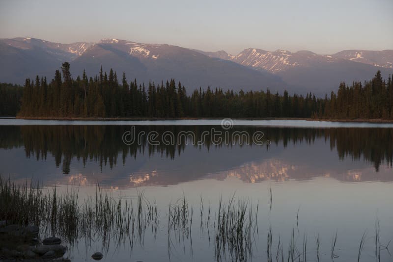Lake Sky Reflections stock photo. Image of clouds, cassiar - 55925486