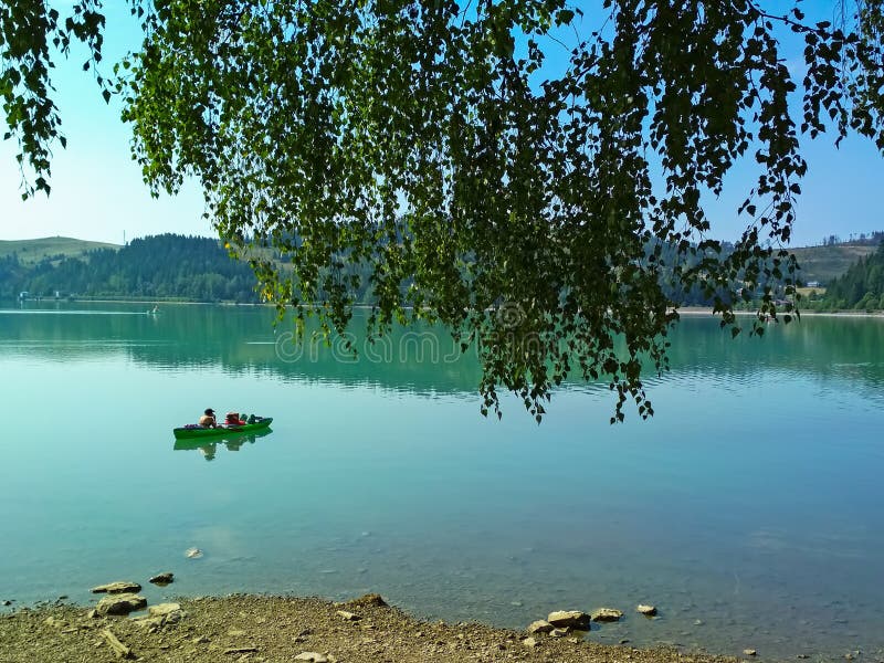 Lake with boat in Slovakia editorial stock image. Image of plants ...