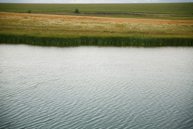 A Lake in a Steep Valley, on a Cloudy, Spring Day. Wallpaper Landscape ...