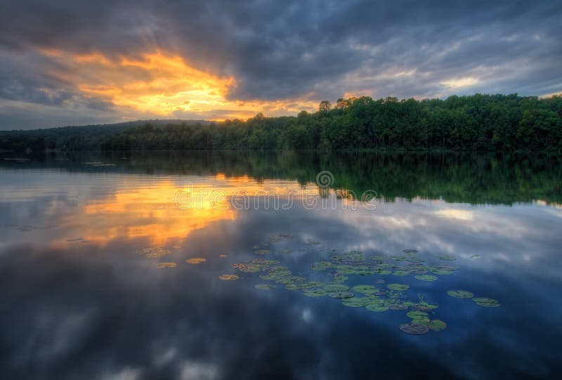 Sunset On A Remote Forest Lake Stock Image - Image of shore, rural ...