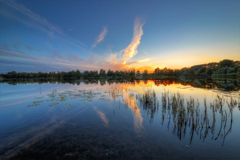 Lake at sunset stock photo. Image of mirror, angle, format - 42957010