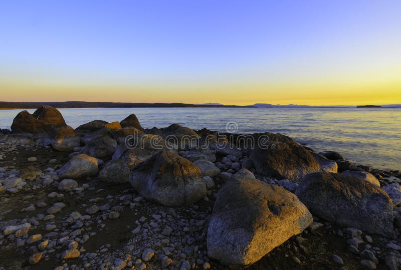 Lake sunset and rocks stock image. Image of haze, light - 37570389