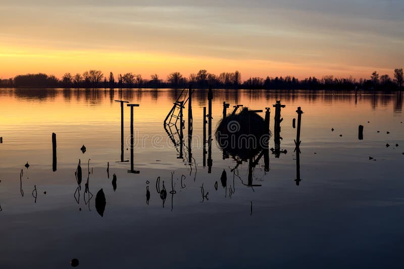 Lake at Sunset with the Sky Casted in the Water Seen from the Shore ...