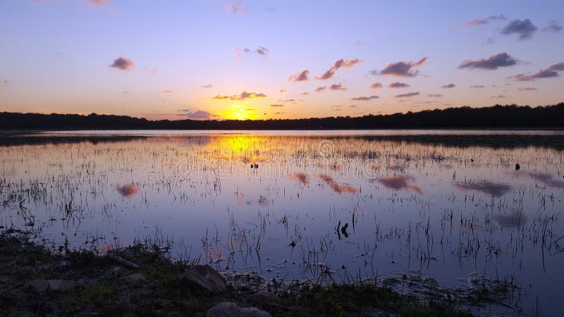 Beautiful Sundown View Reflection on the Lake. Stock Image - Image of ...