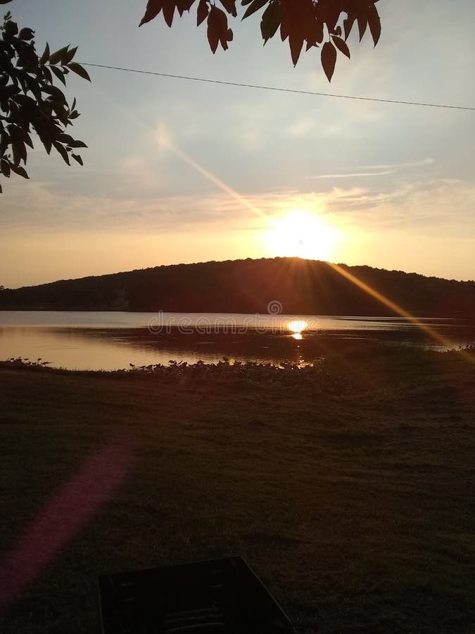 Lake sunset stock image. Image of sunset, cookout, lake - 126730497