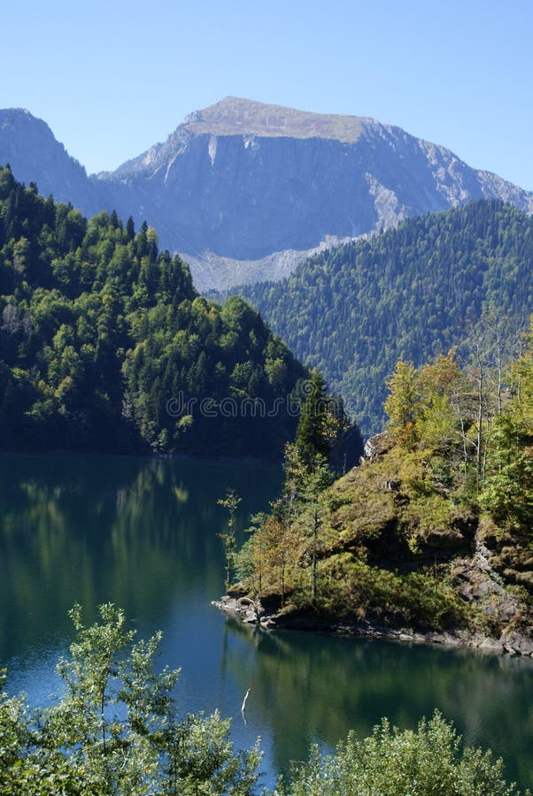 The Lake is Surrounded by Mountains and Forests Stock Image - Image of ...