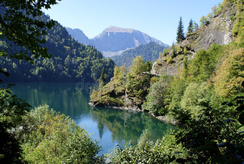 The Lake is Surrounded by Mountains and Forests Stock Photo - Image of ...