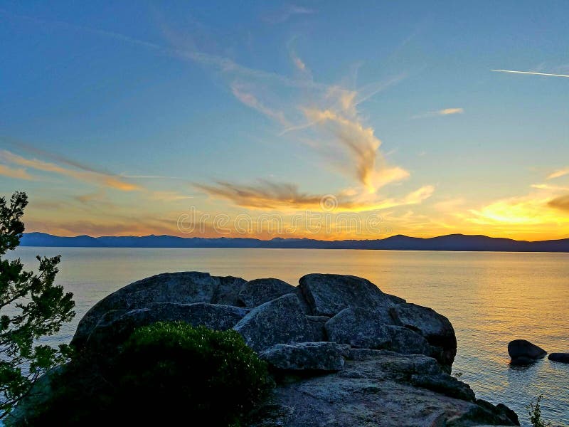 Sunset Rock stock photo. Image of rock, lake, peaceful - 98818158