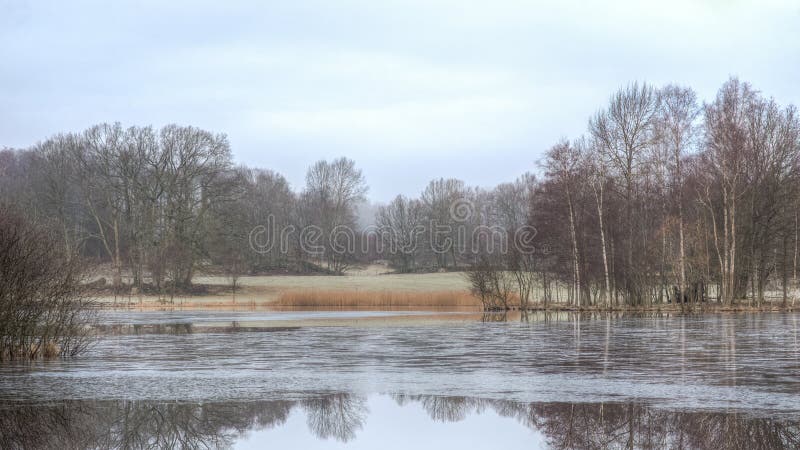 Lake with thawing ice stock image. Image of reflection - 39969613