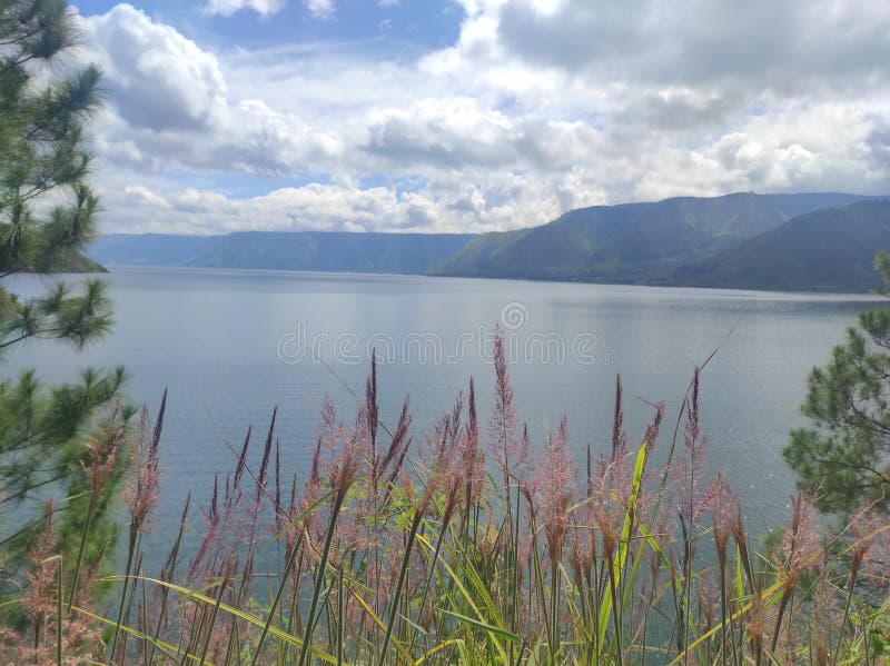 Lake toba indonesian stock photo. Image of reflection - 262317756