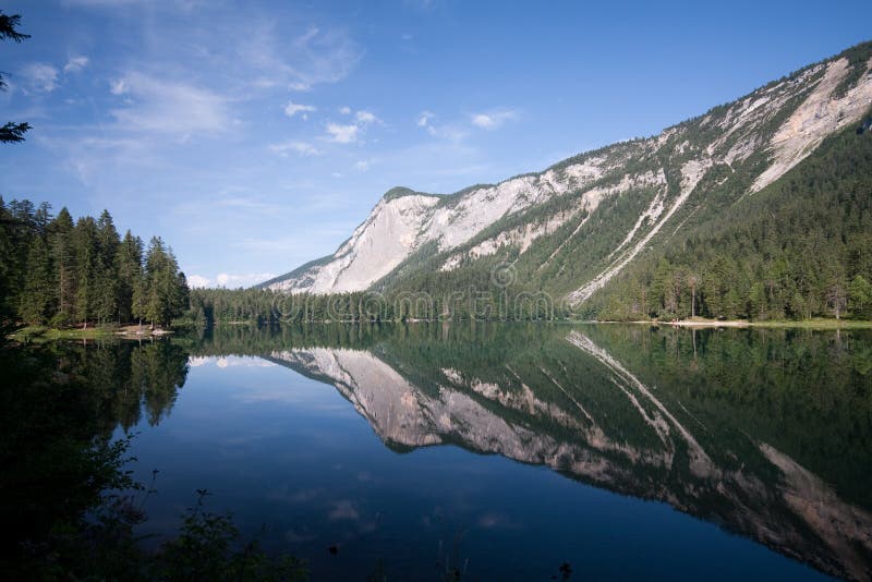 Lake Tovel, stock image. Image of water, reflection, dolomites - 10799961