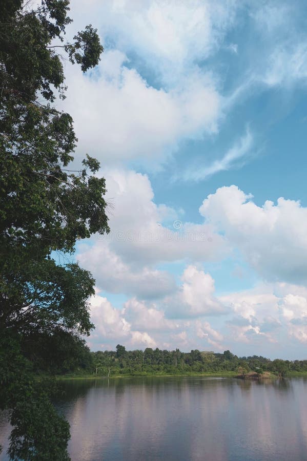 The Lake of Trees and Clouds is Beautiful and Cool Stock Image - Image ...