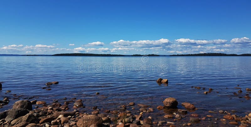 Lake view from the beach stock image. Image of horizon - 175304737