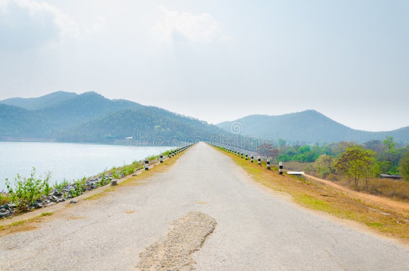 Road on the dam stock photo. Image of mountain, nature - 111997668