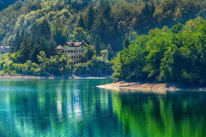 Lake View Building with Reflections on Water Stock Image - Image of ...