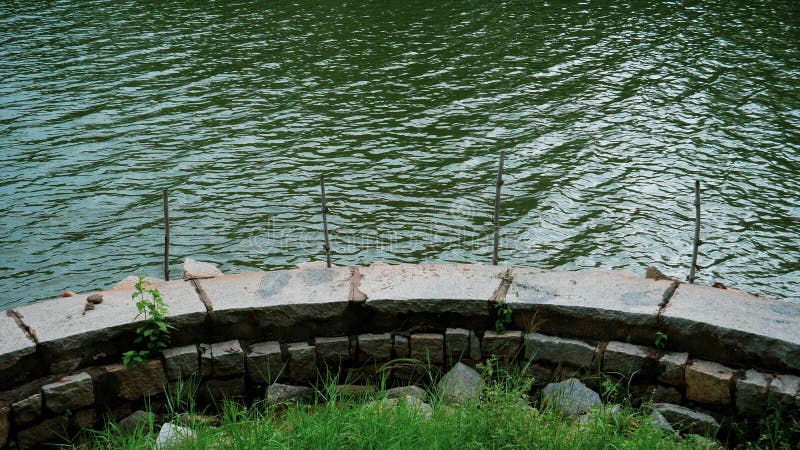 Rock circle arc Lake view stock image. Image of scenery - 166523579