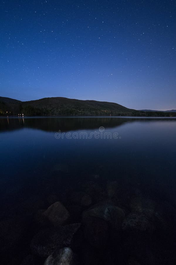 Lake View Under Clear Blue Night Sky During Night Time Picture. Image ...