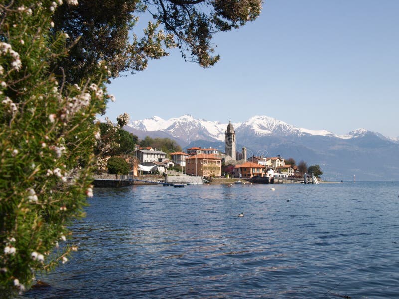 The Lake and the Village of Cremia Stock Image - Image of hill, mist ...
