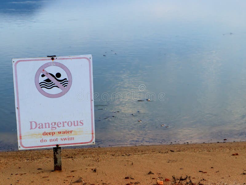 Lake with Warning Signs Prohibiting Swimming Stock Photo - Image of ...