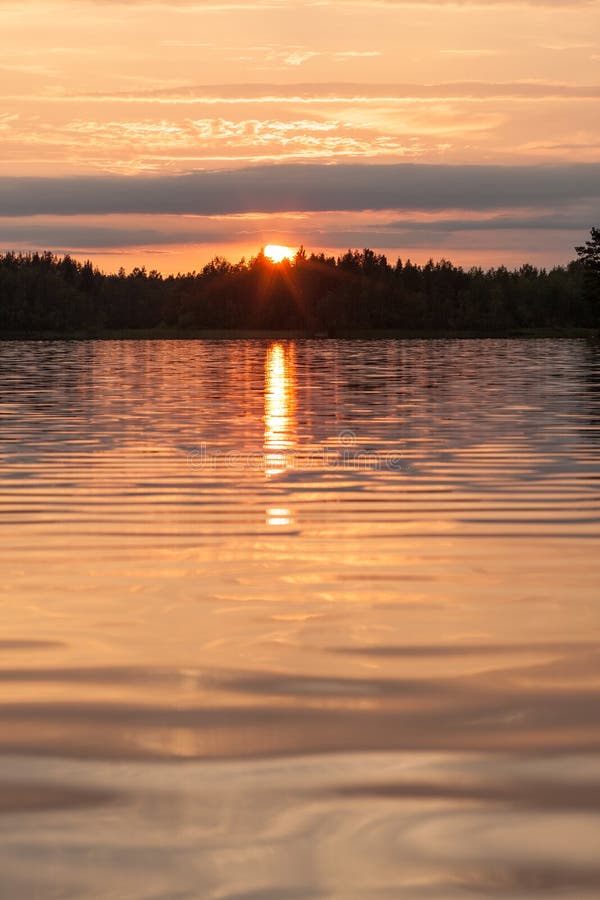 Lake water at sunset stock image. Image of yellow, outdoors - 82226871