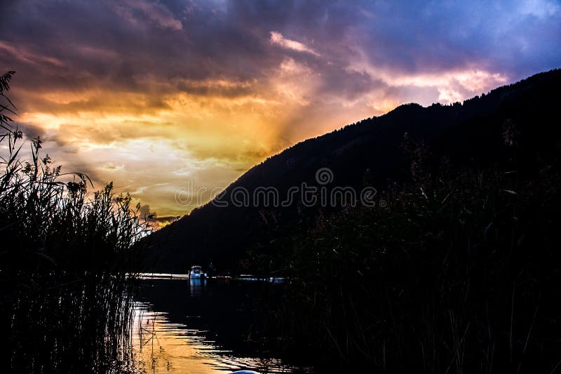 Lake Weissensee in Austria stock photo. Image of park - 130583932
