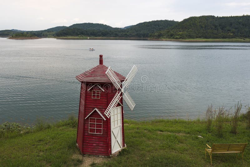 Lake windmill stock image. Image of white, windmill, water - 59329711