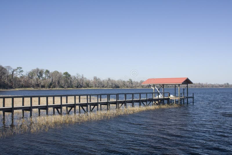 Lakefront boat dock stock image. Image of tranquil, outdoor - 7972361