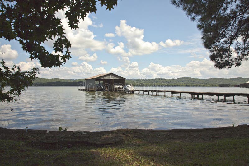 Lakefront Yard with Boathouse and Sky Stock Image - Image of estate ...