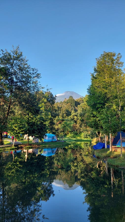 Lakeside Camping Ground with Mountain View Stock Image - Image of tree ...