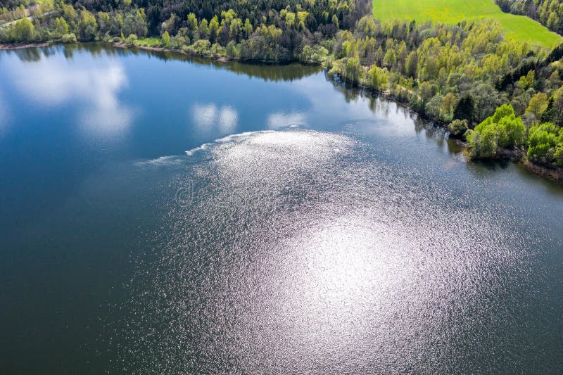 Lakeside with Colorful Trees in Spring Sunlight and Sky Reflection at ...