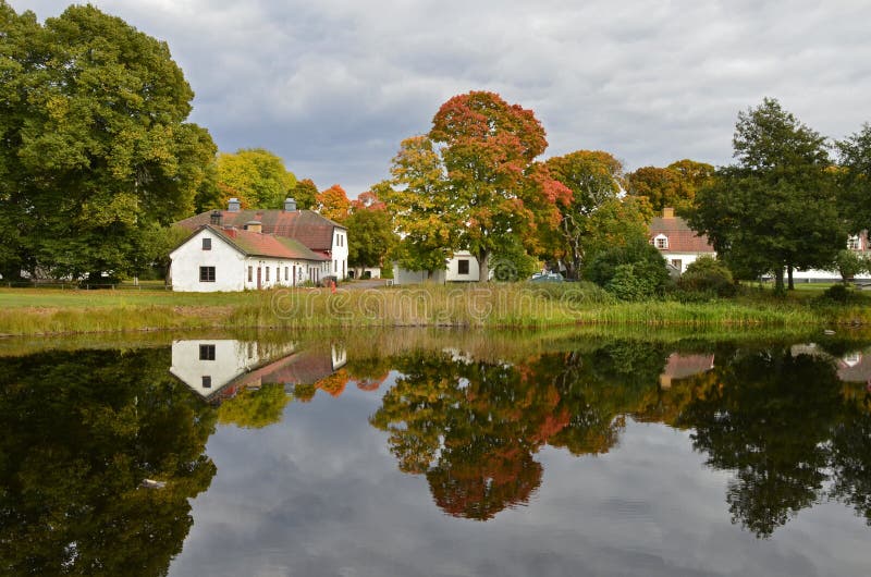 Lakeside Cottages and Mountains Stock Image - Image of colour, scenic ...