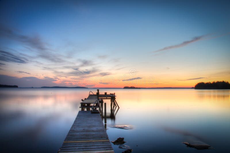 Lakeside pier stock photo. Image of lake, side, sunrise - 20108856