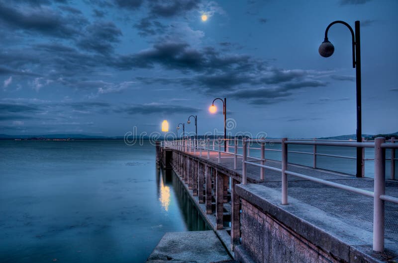 Lakeside Pier before Sunrise Stock Photo - Image of trasimene, italy ...