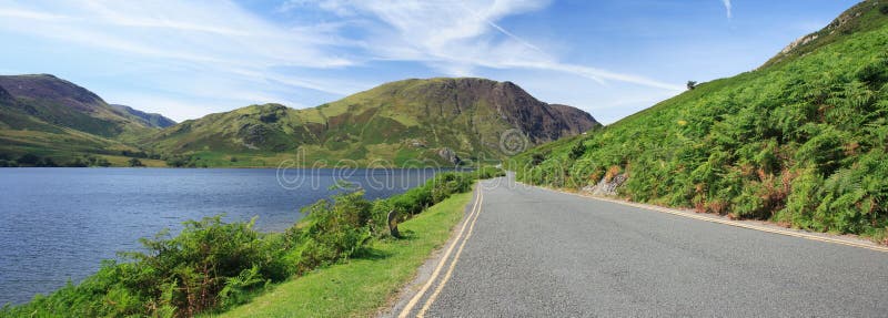 Lakeside road Panorama stock photo. Image of remote, peak - 3042036