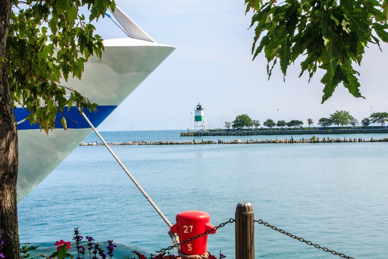 Lakeside Scene with Cruise Ship and Lighthouse Stock Image - Image of ...