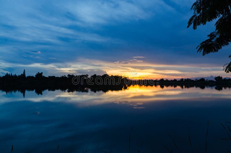 Lakeside sunset stock image. Image of nature, beauty - 78048419