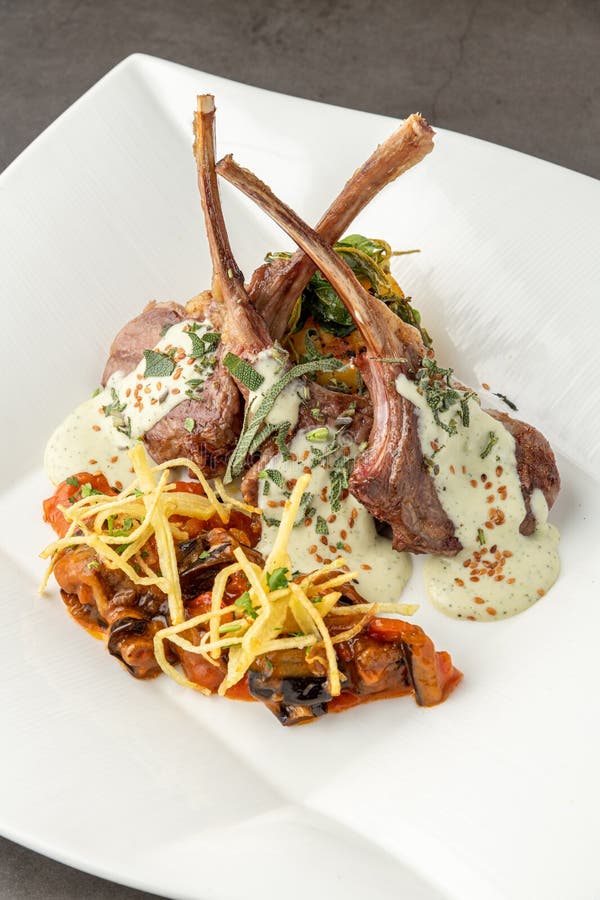 Lamb Chops with Various Vegetables at a Fine Dining Restaurant Stock ...