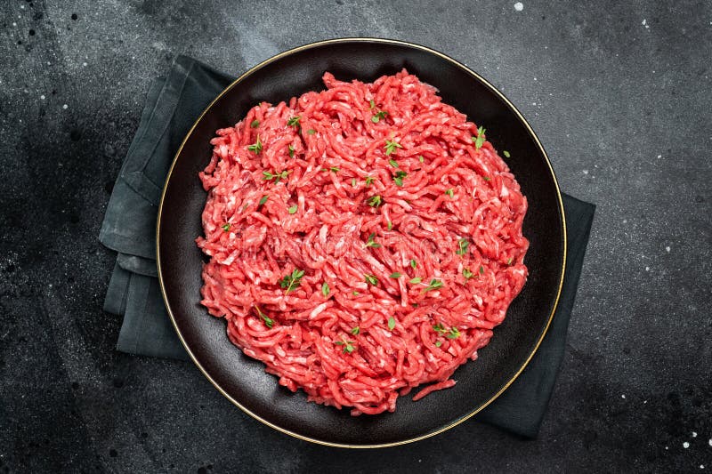 Lamb Mutton Ground Mince Raw Meat, Forcemeat on a Black Plate, Top View ...