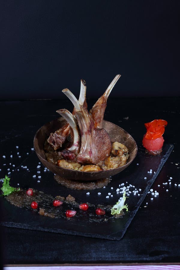 Lamb Rack with Couscous and Sauce Served in a Restaurant Stock Image ...