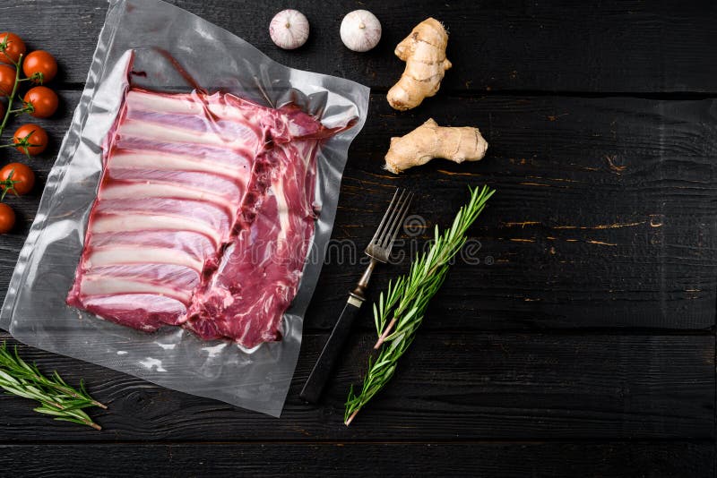 Lamb Rib Pack, on Black Wooden Table Background, Top View Flat Lay ...