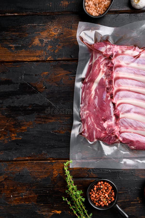 Lamb Rib Pack, on Old Dark Wooden Table Background, Top View Flat Lay ...