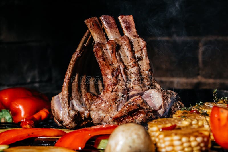 Lamb Ribs on Board with Grilled Vegetables. Restaurant Menu, Culinary ...