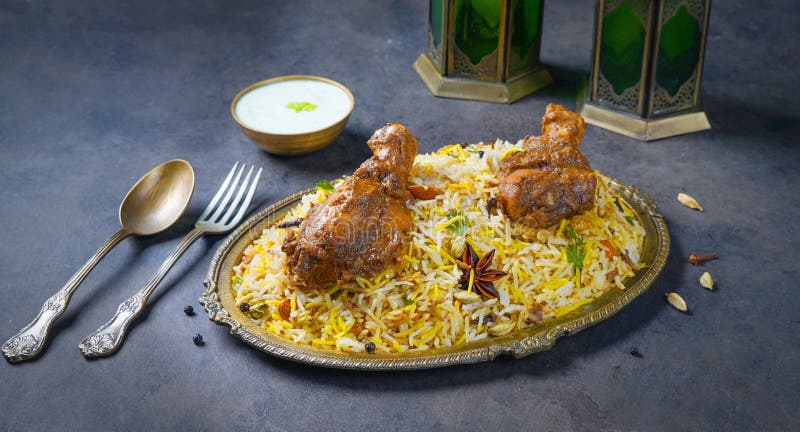 Lamb Shank Biryani with Raita Served in a Dish Side View on Dark ...