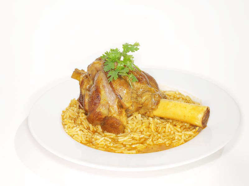 Lamb Shank in Juicy Yellow Rice Stock Photo - Image of cooking, leaf ...