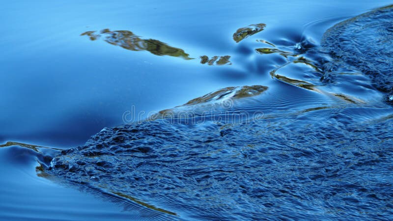 Flowing Water with Reflection of the Sky Stock Image - Image of ...