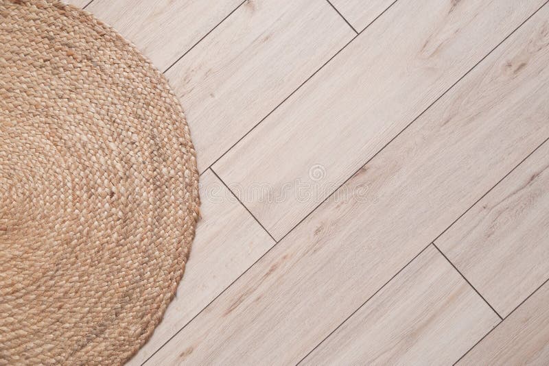 Laminate Flooring Panels with Chamfer and Wicker Carpet. Top View ...