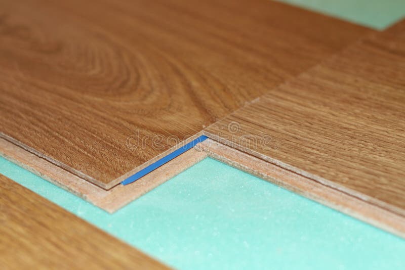 Laying laminate flooring stock photo. Image of flooring - 17318996